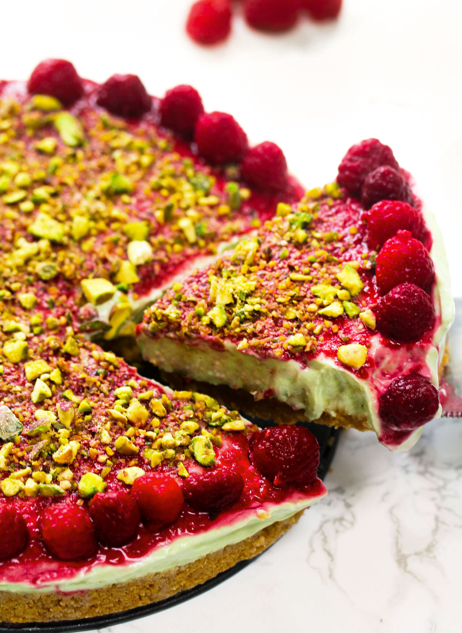Raspberry and Pistachio Cheesecake - Sims Home Kitchen